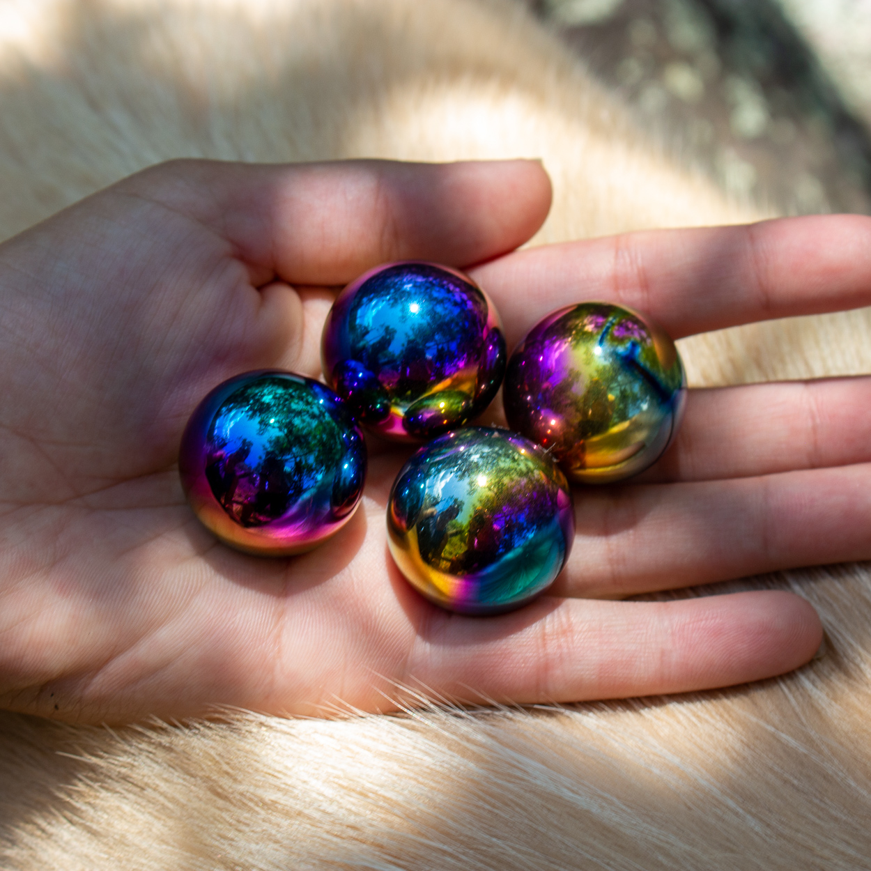 Titanium Quartz Sphere - The Crystal Council